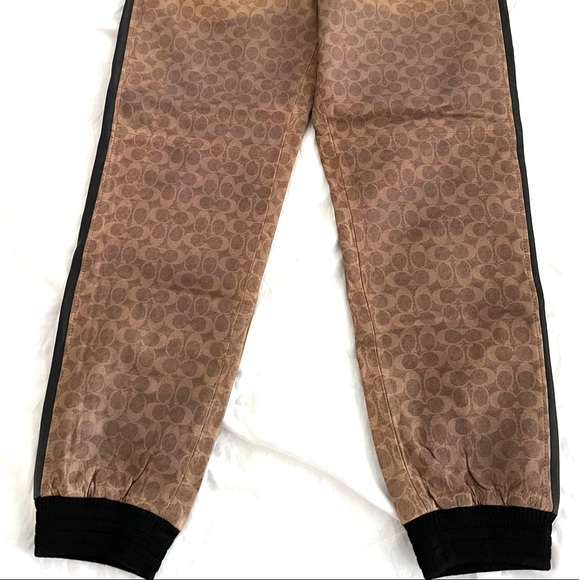 outlets shop COACH logo printed faux leather sweatpants. Size XL
